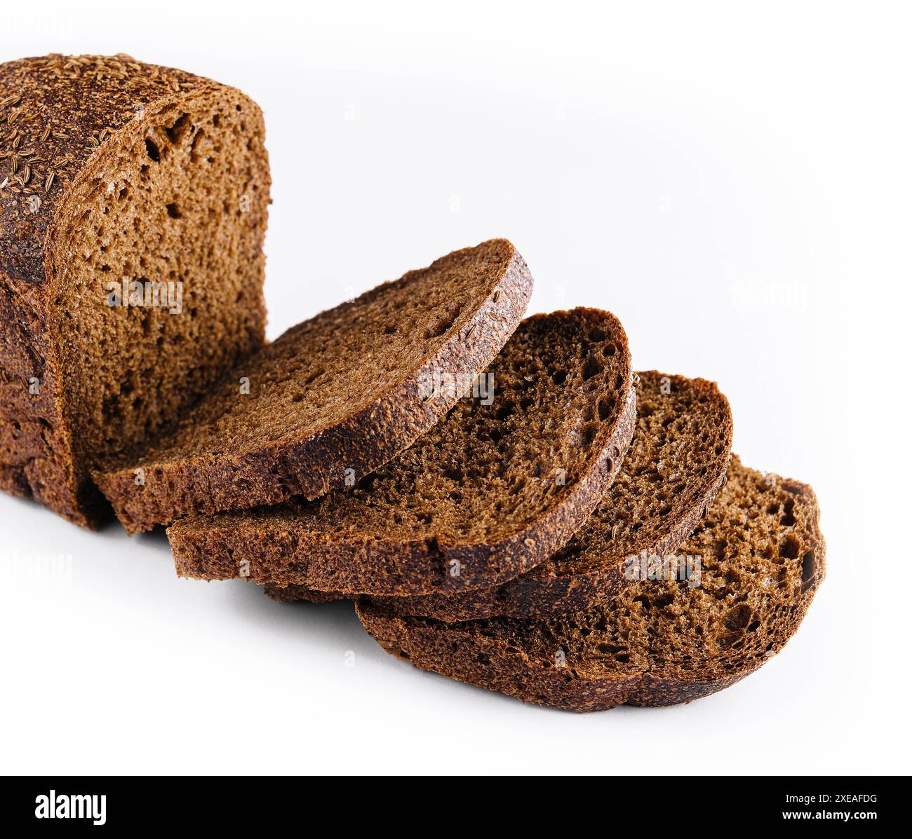 Cut loaf of rye bread isolated on white Stock Photo - Alamy