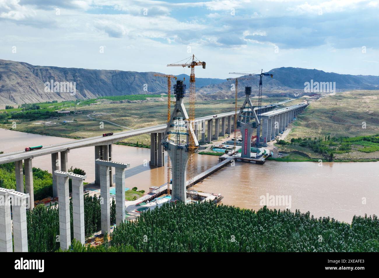 ZHONGWEI, CHINA - JUNE 26, 2024 - Construction workers work on the ...