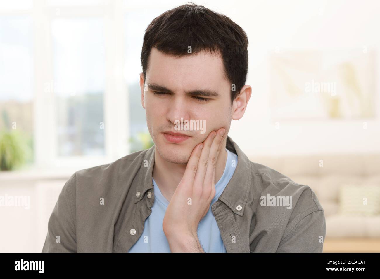 Young man toothache hi-res stock photography and images - Alamy