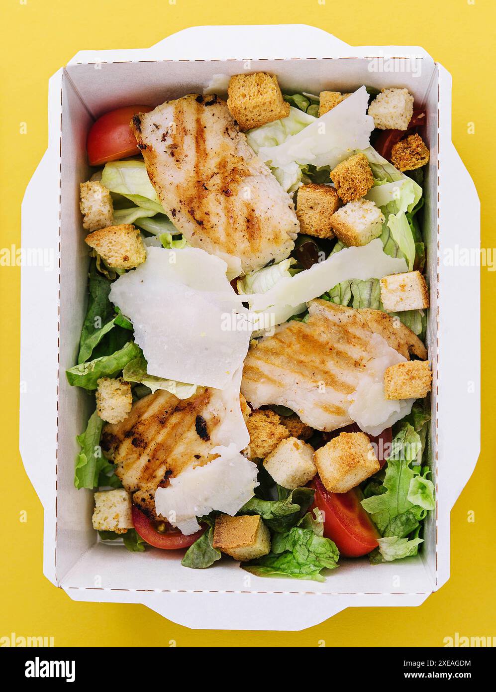 Caesar salad packed on craft box for take away Stock Photo - Alamy