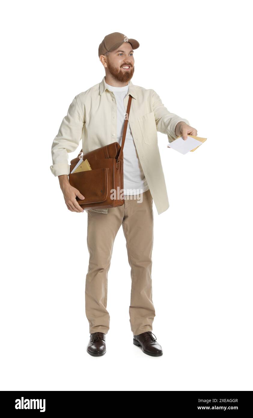Happy young postman with brown bag delivering letters on white ...