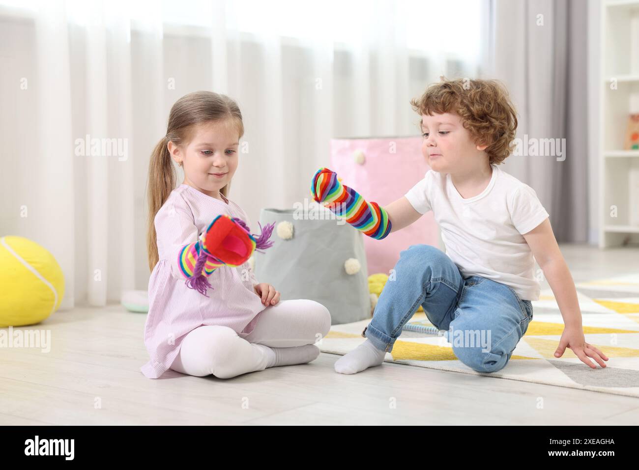 Children playing with puppets hi-res stock photography and images - Alamy
