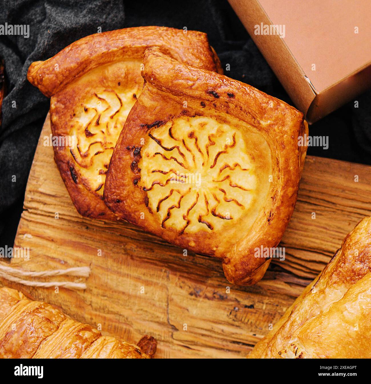 Pastries with boxes for delivery on top view Stock Photo - Alamy