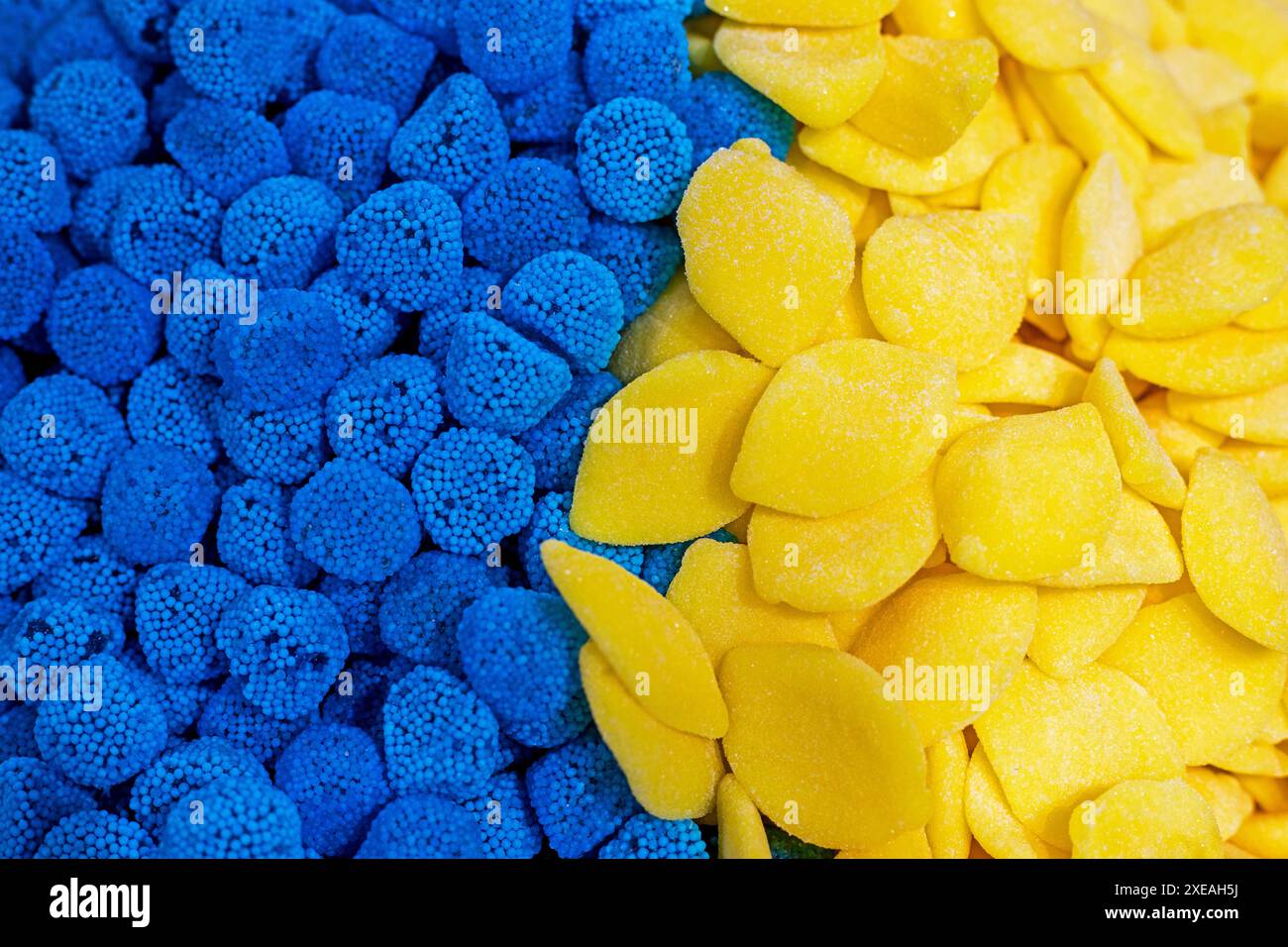 blue and yellow jelly sweet sour candies Stock Photo - Alamy