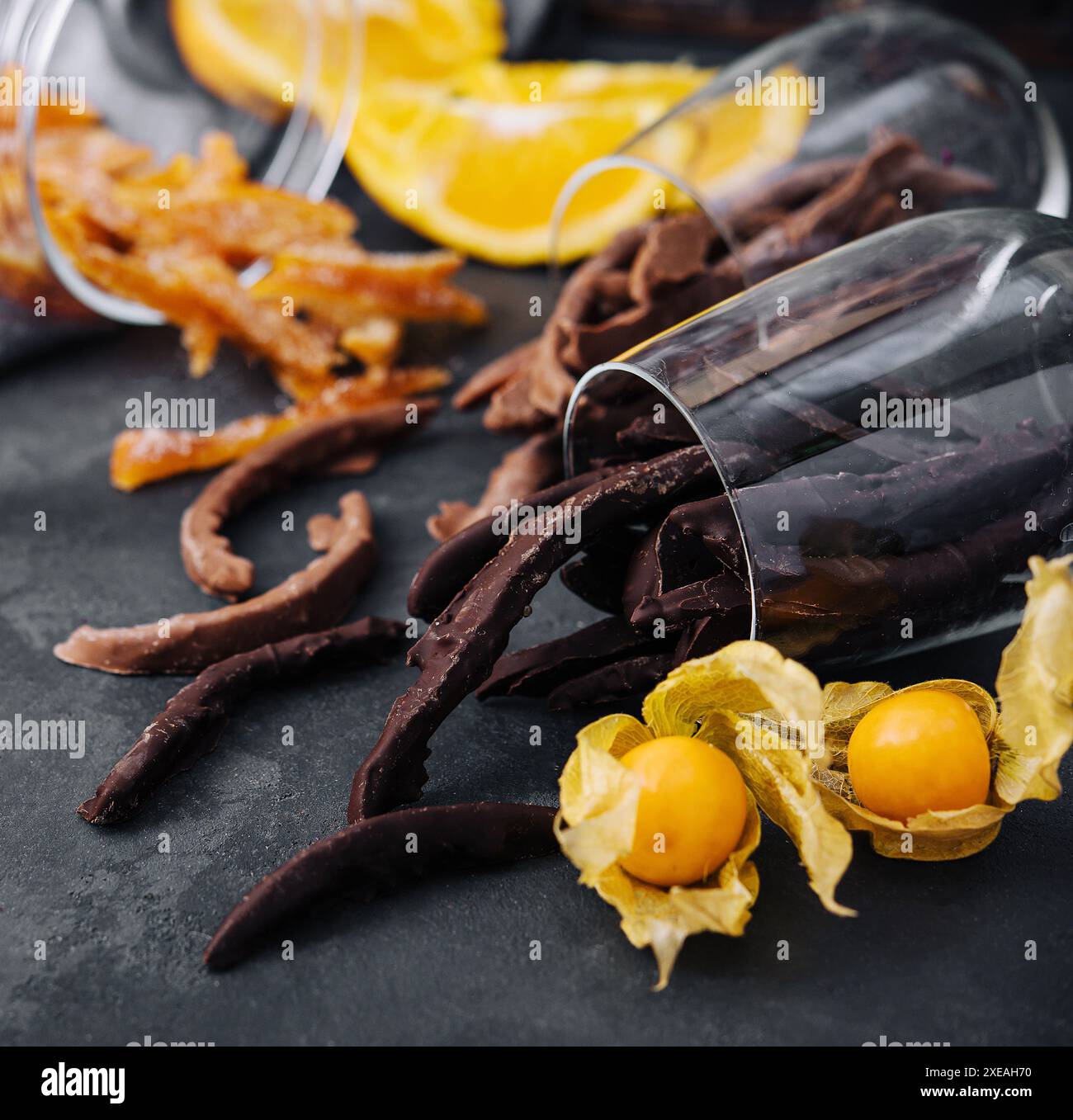 Stack of chocolate sticks on black stone Stock Photo - Alamy