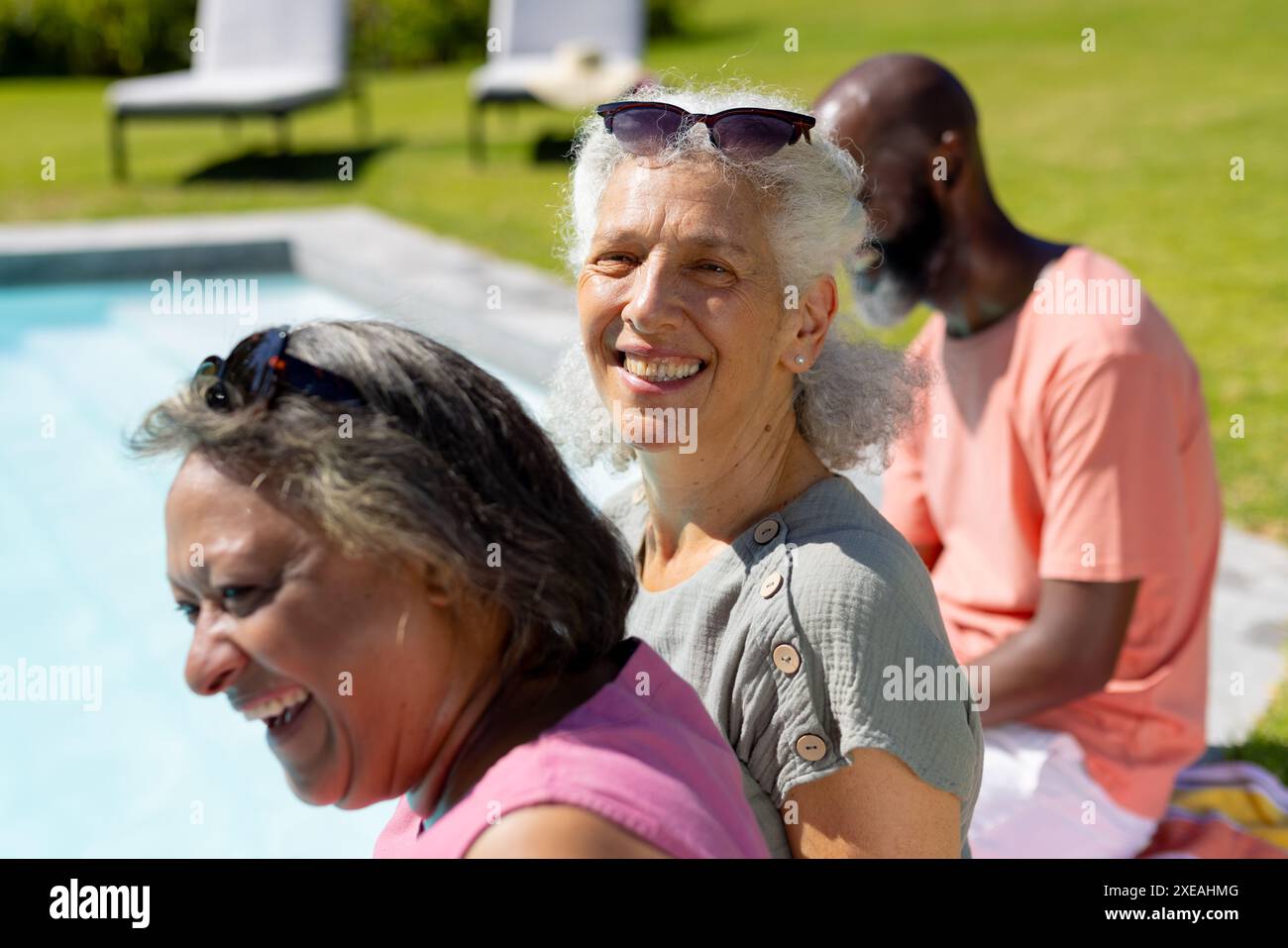 Diverse friends relaxing pool enjoying hi-res stock photography and ...