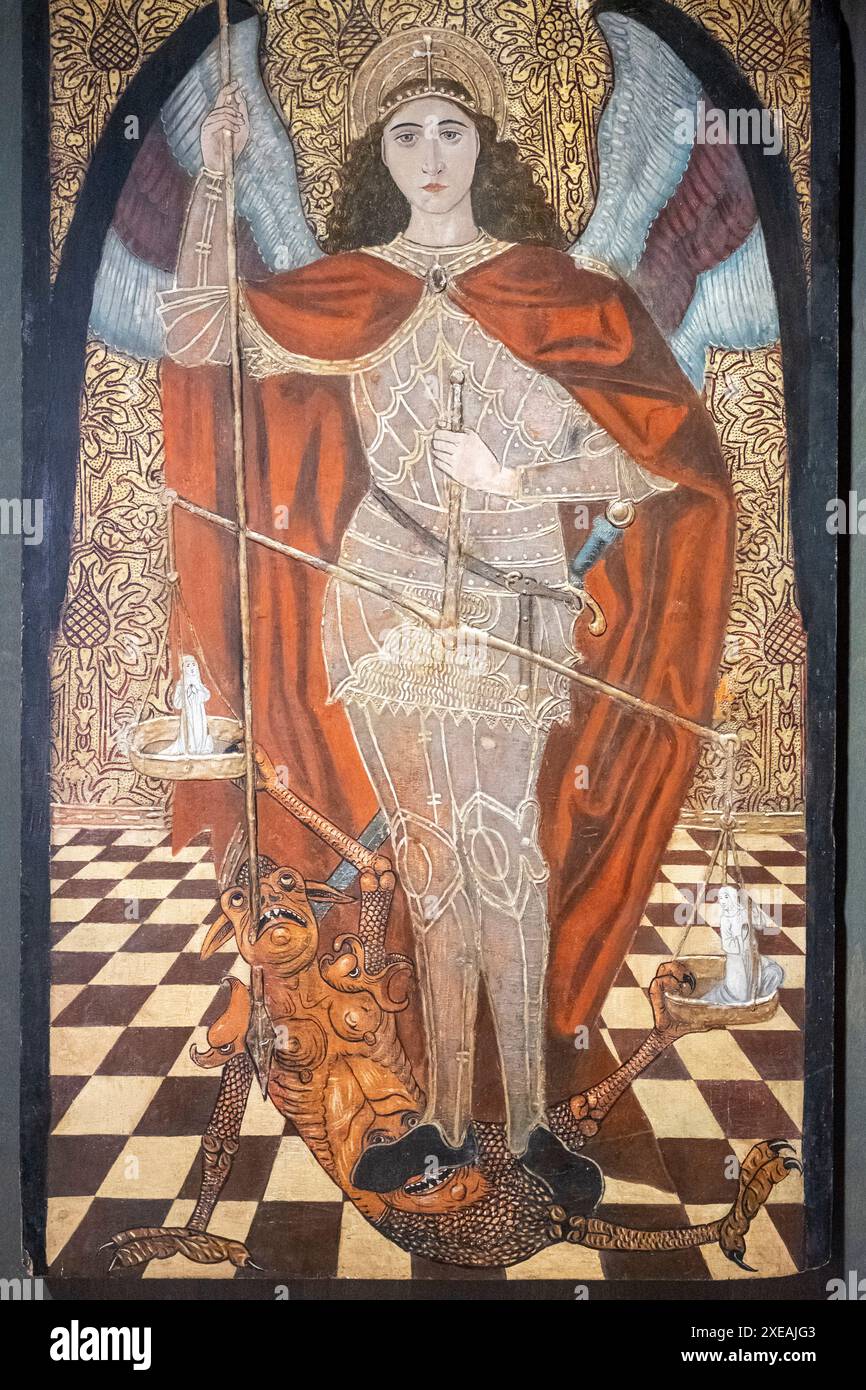 Saint Michael archangel defeating the devil Stock Photo - Alamy