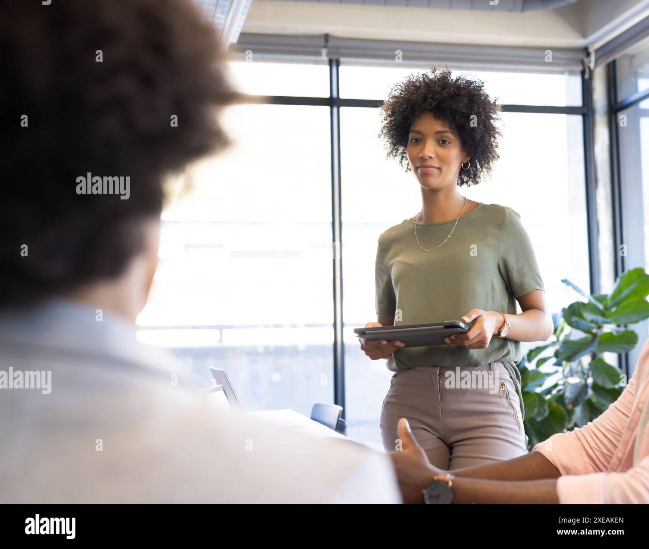 Modern female professional in casual hi-res stock photography and ...