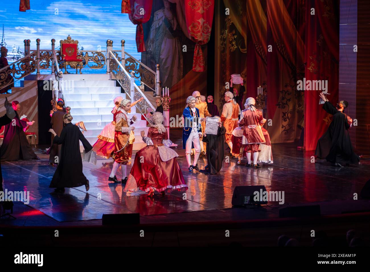 Actresses and actors acting and singing in the musical Stock Photo - Alamy