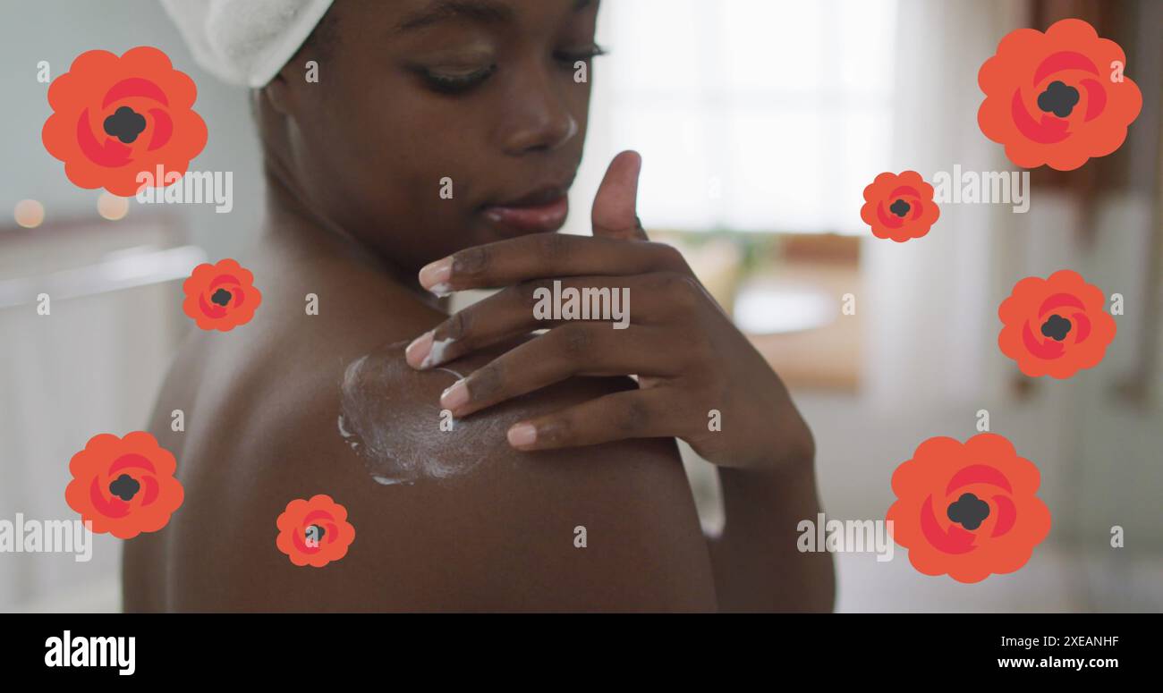 Image of red flowers over african american woman using body lotion ...
