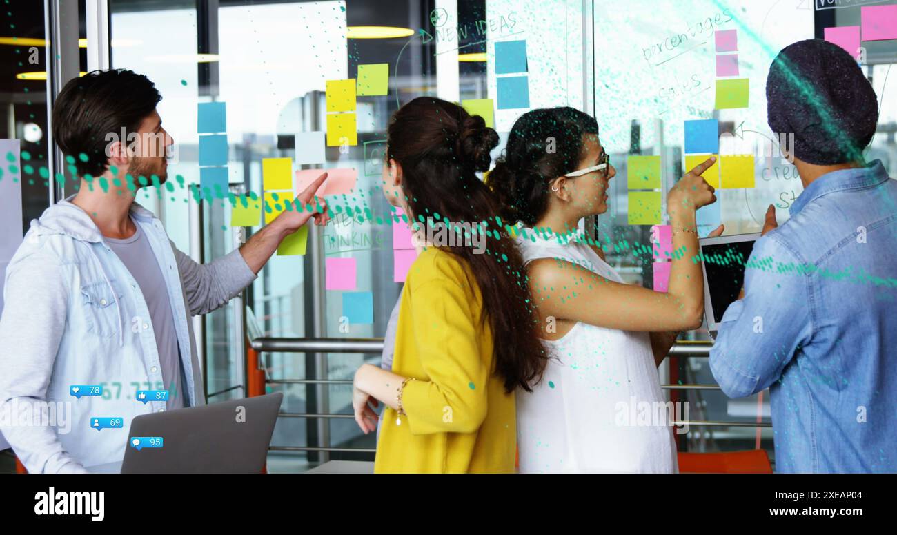 Image of data processing over diverse business people taking notes ...