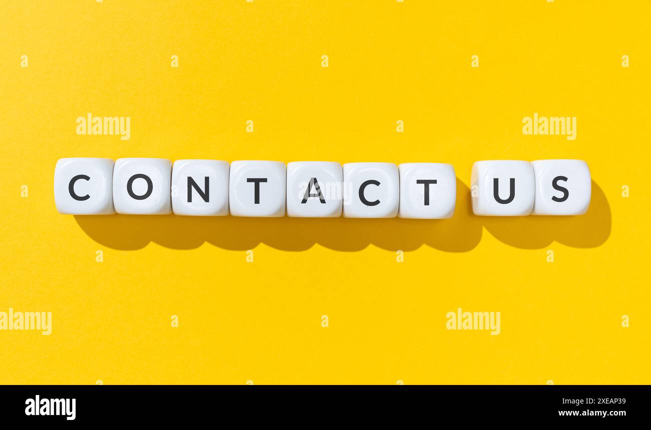 Contact us word on cube blocks isolated on yellow background Stock ...