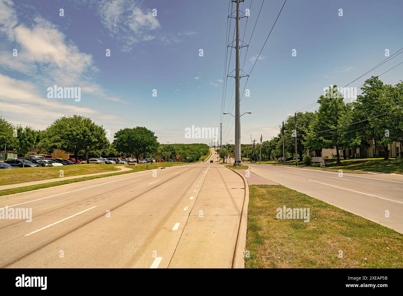 empty road with destination in horizon. road way with power lines ...