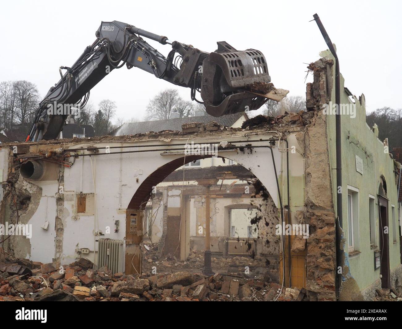 Excavators, house demolition, urban renovation Stock Photo - Alamy