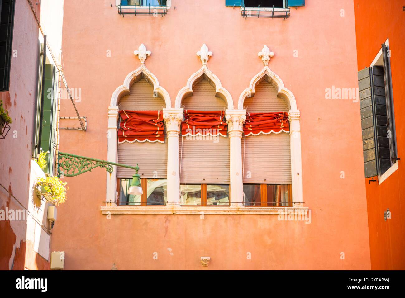 Red wall green shutters hi-res stock photography and images - Alamy