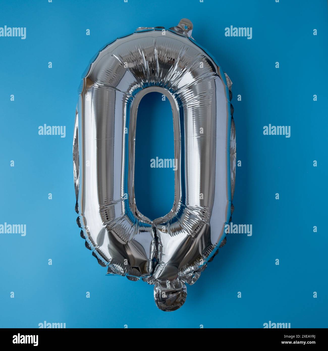 0 zero metallic balloon isolated on blue background. Greeting card ...