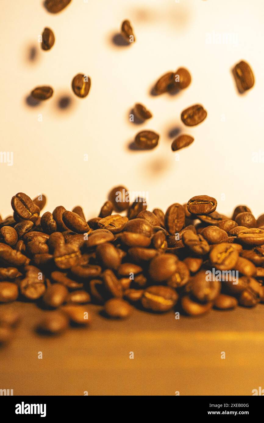 Roasted coffee beans flying in the air. Background for coffee Stock ...