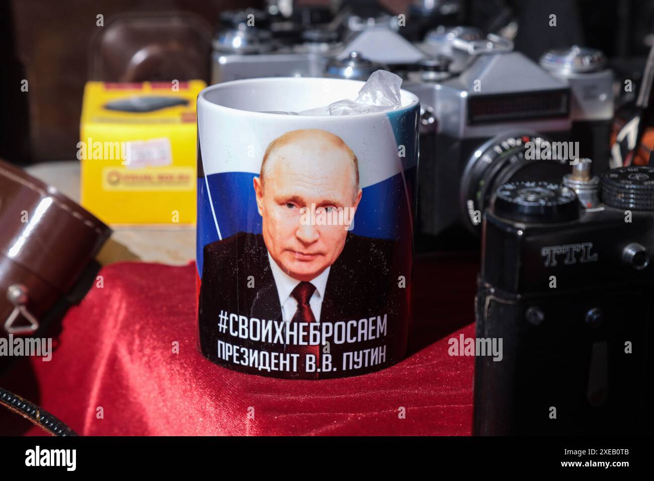 June 22, 2024, St. Petersburg, Russia: A souvenir mug in the colors of ...