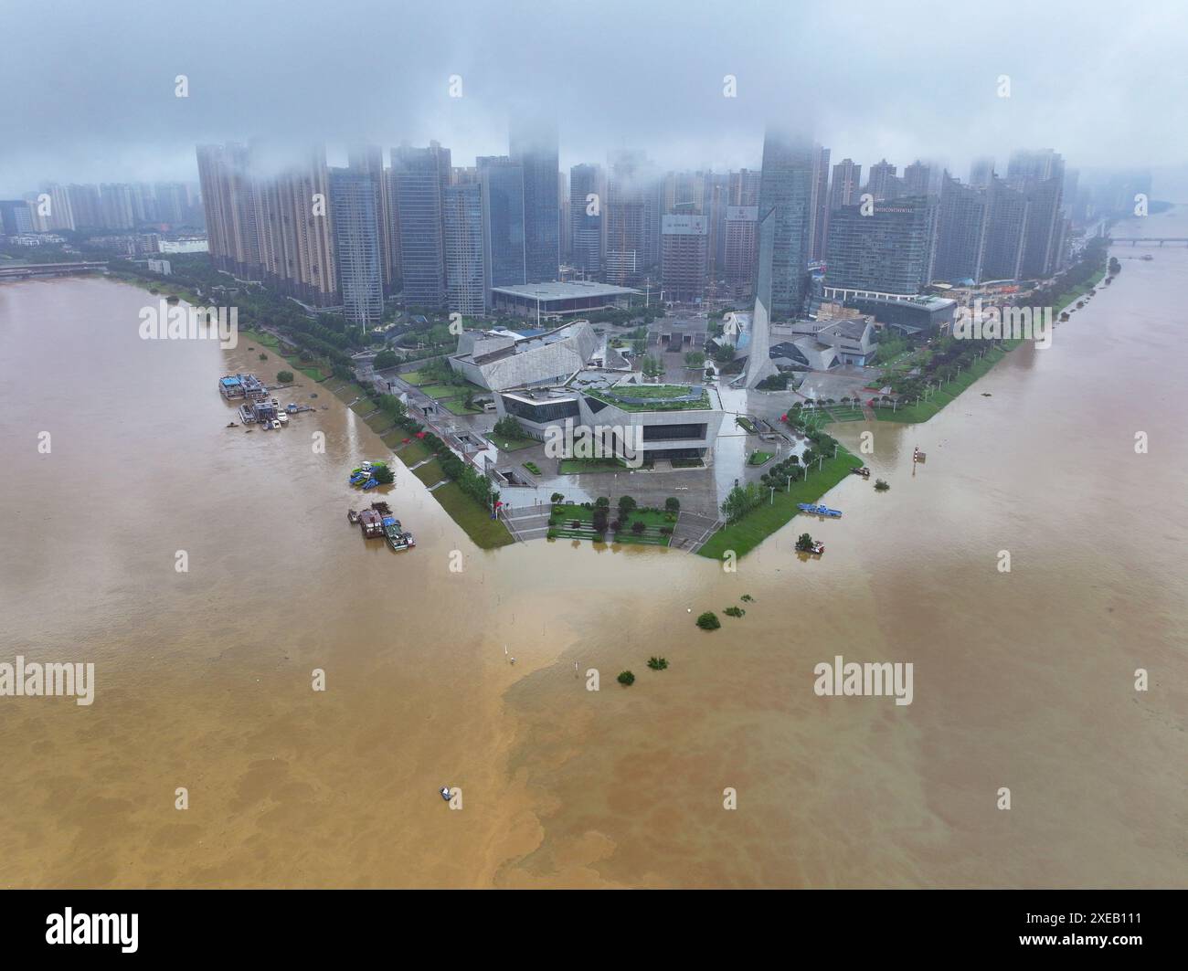 Beijing, China. 26th June, 2024. An aerial drone photo taken on June 26 ...