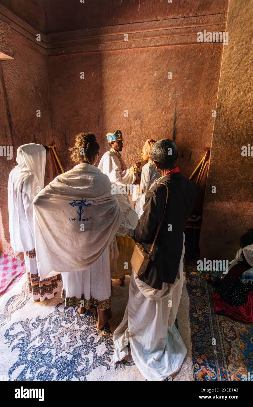Orthodox Christian baptism ceremony at St. George Church captures a ...