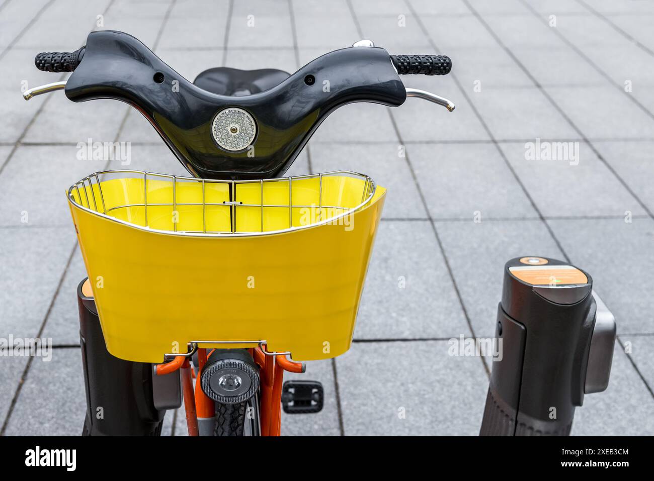Bicycle With Yellow Basket In City Bike Rental Service Station Racks ...