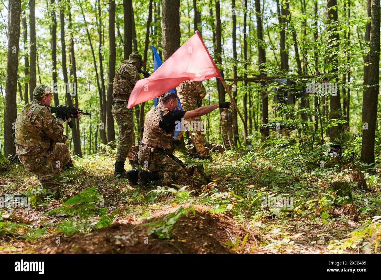 A disciplined and specialized military unit, donned in camouflage ...