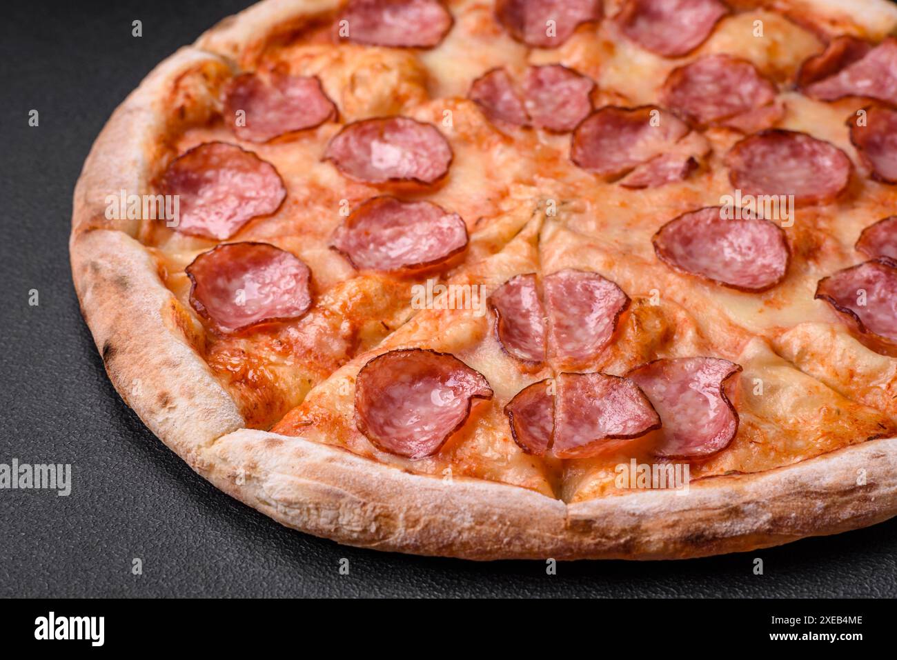 Tasty italian pizza salami cheese hi-res stock photography and images ...