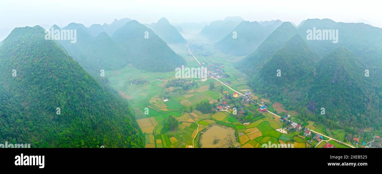 Landscape of Bac Son valley around with houses on pitotis in the ...