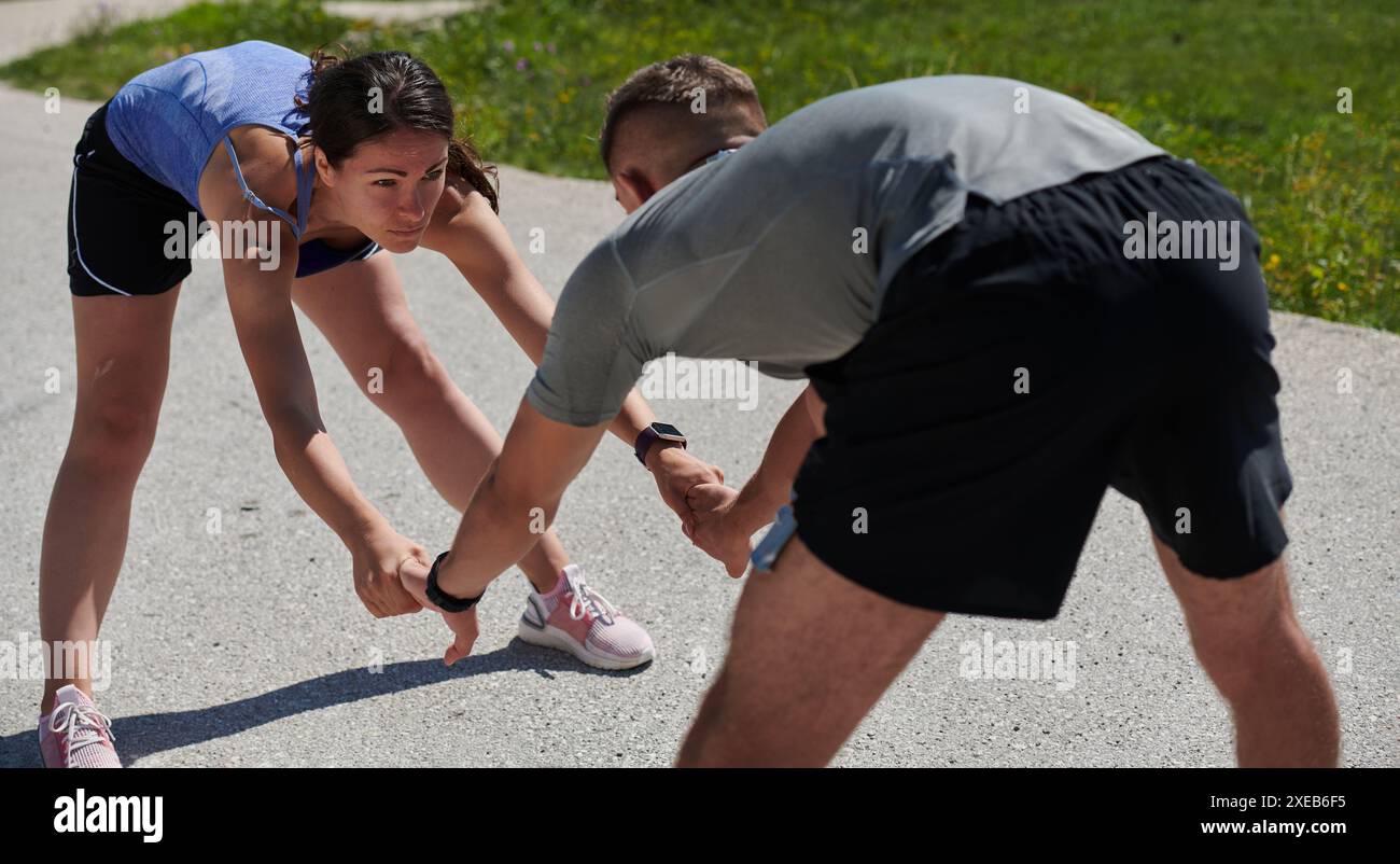 Exercise, mockup and couple workout and stretch together outdoors in ...