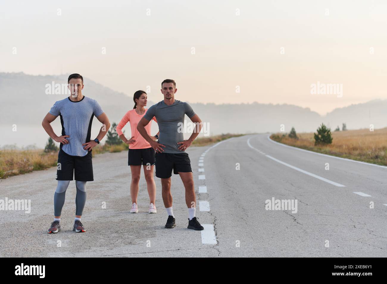 Morning Prep: Group of Athletes Getting Ready for a Run Stock Photo - Alamy