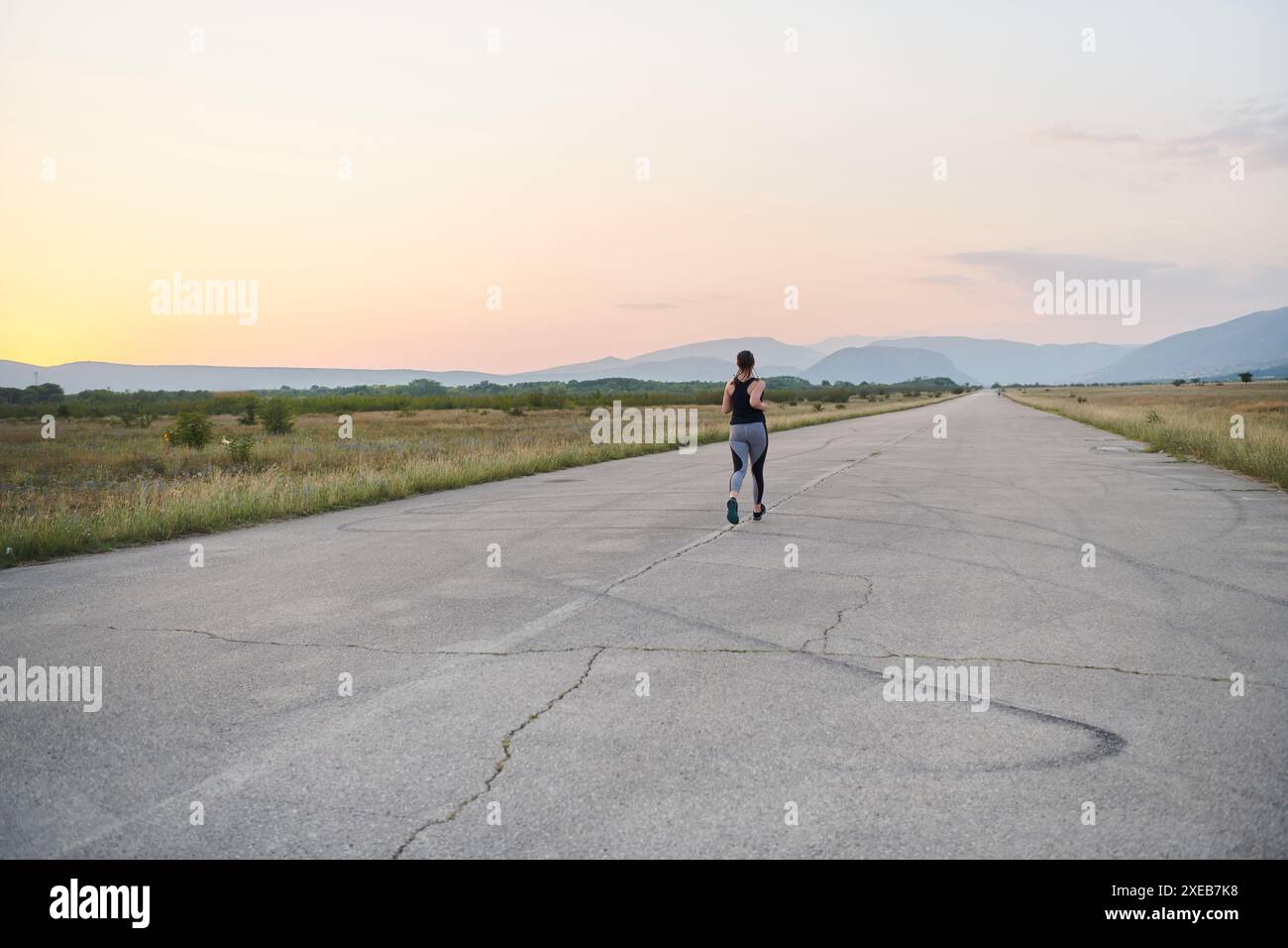 Solo Stride: Determined Athlete Woman Embarks on Fitness Journey for ...