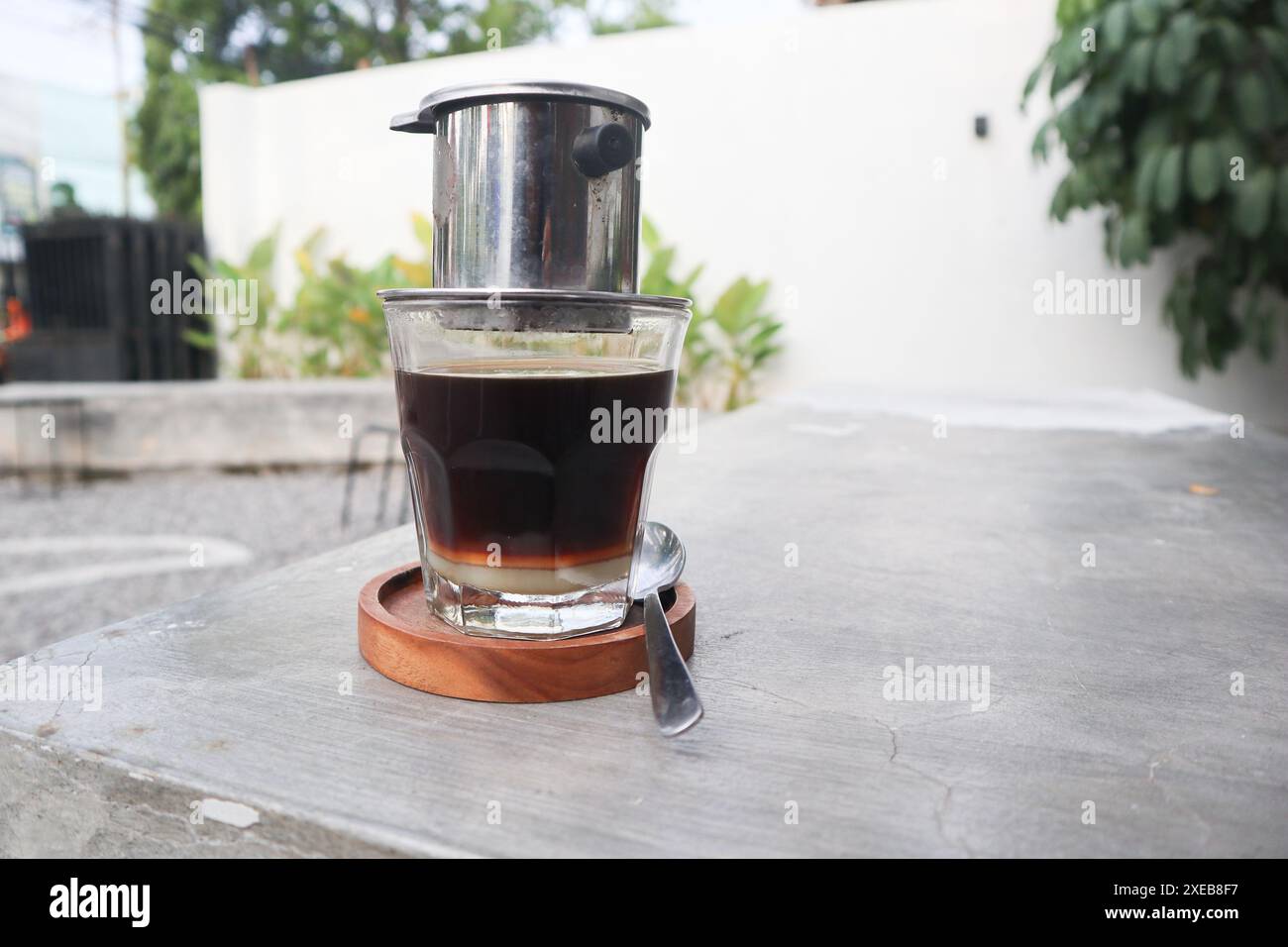 Vietnamese drip, Vietnamese coffee with condensed milk in glass cups ...