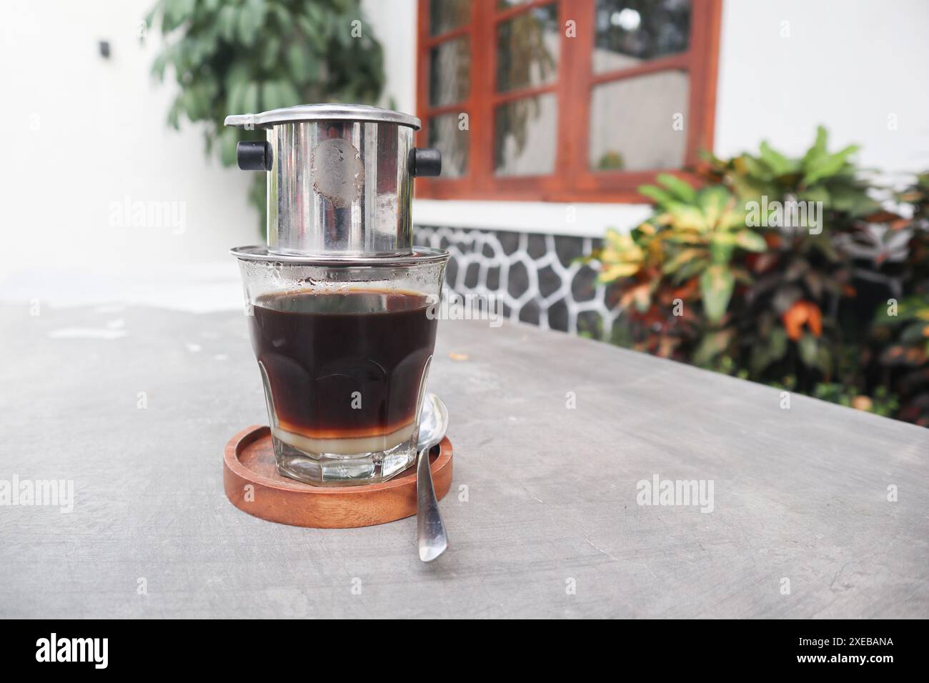 Vietnamese drip, Vietnamese coffee with condensed milk in glass cups ...