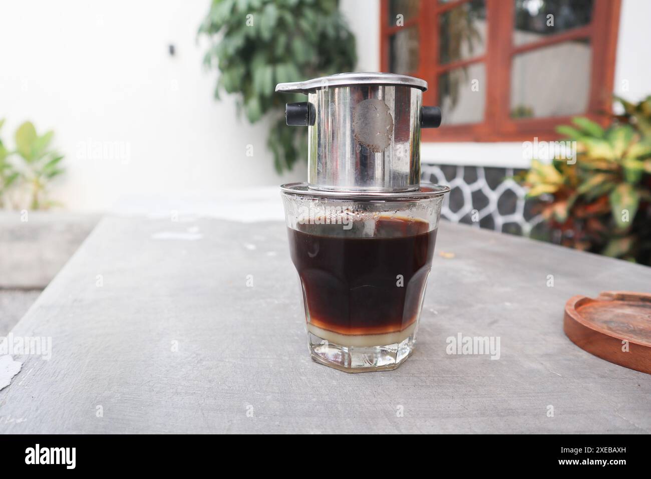 Vietnamese drip, Vietnamese coffee with condensed milk in glass cups ...