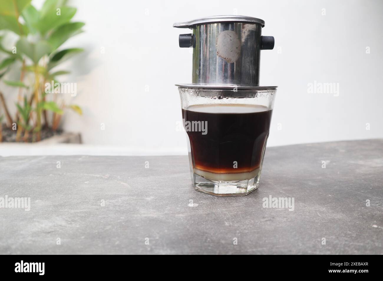 Vietnamese drip, Vietnamese coffee with condensed milk in glass cups ...