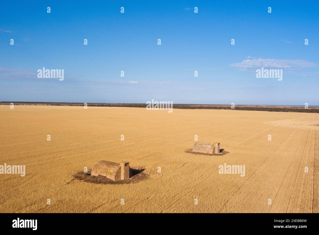 Aerial of concrete bunkers know as Igloos constructed in a wheat field ...