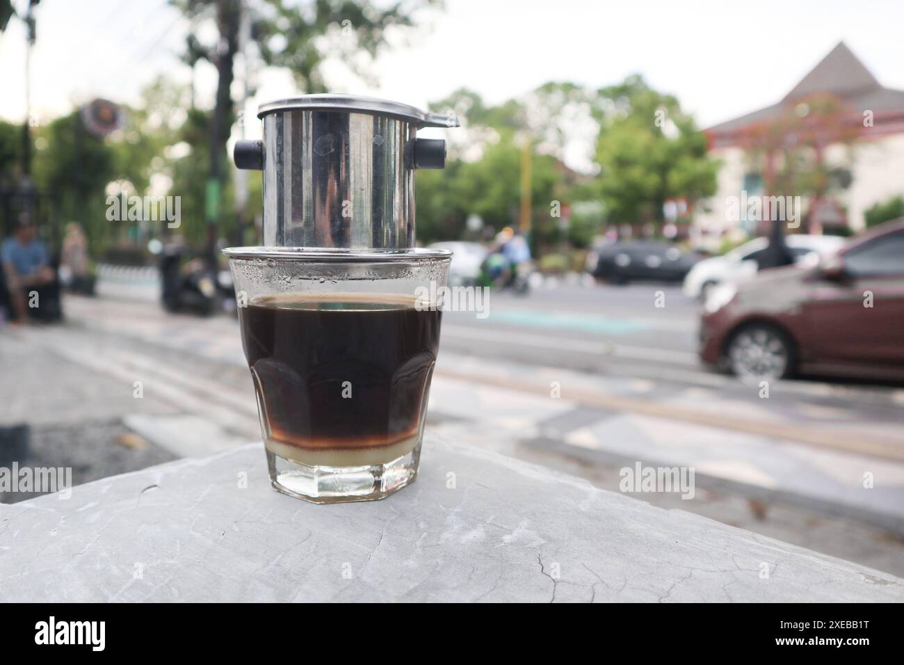 Vietnamese drip, Vietnamese coffee with condensed milk in glass cups ...