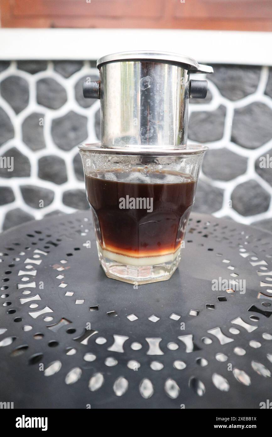 Vietnamese drip, Vietnamese coffee with condensed milk in glass cups ...