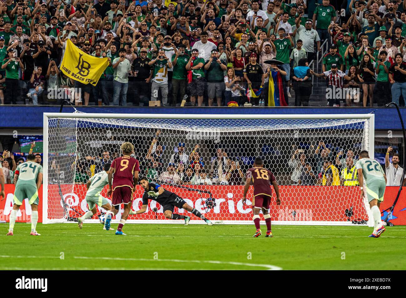 Rafael Romo of Venezuela saves the penalty from Orbelin Pineda of ...