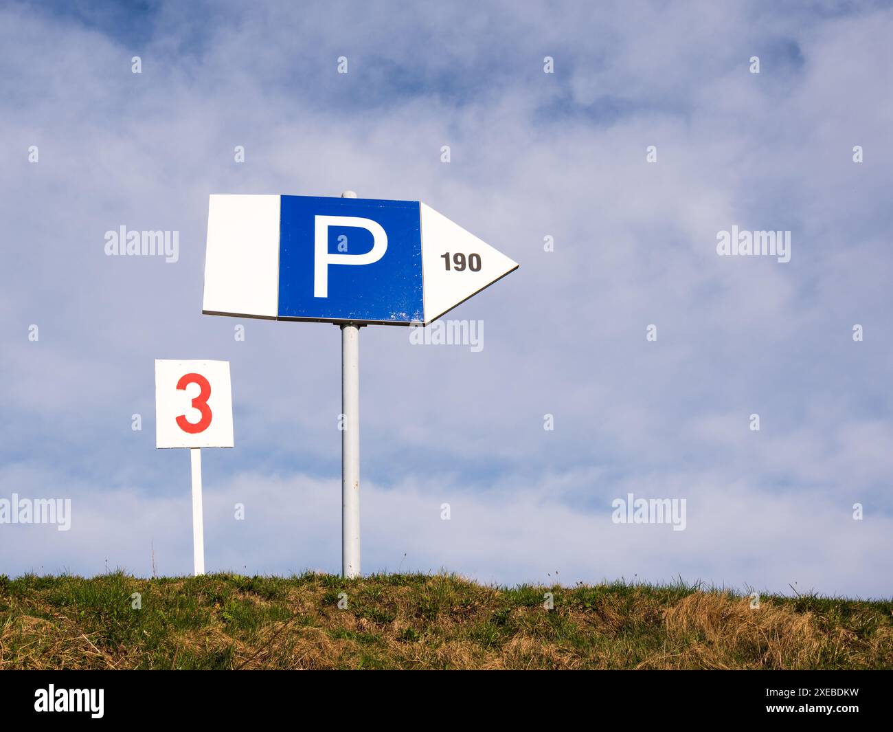 Direction sign and blue sky hi-res stock photography and images - Alamy