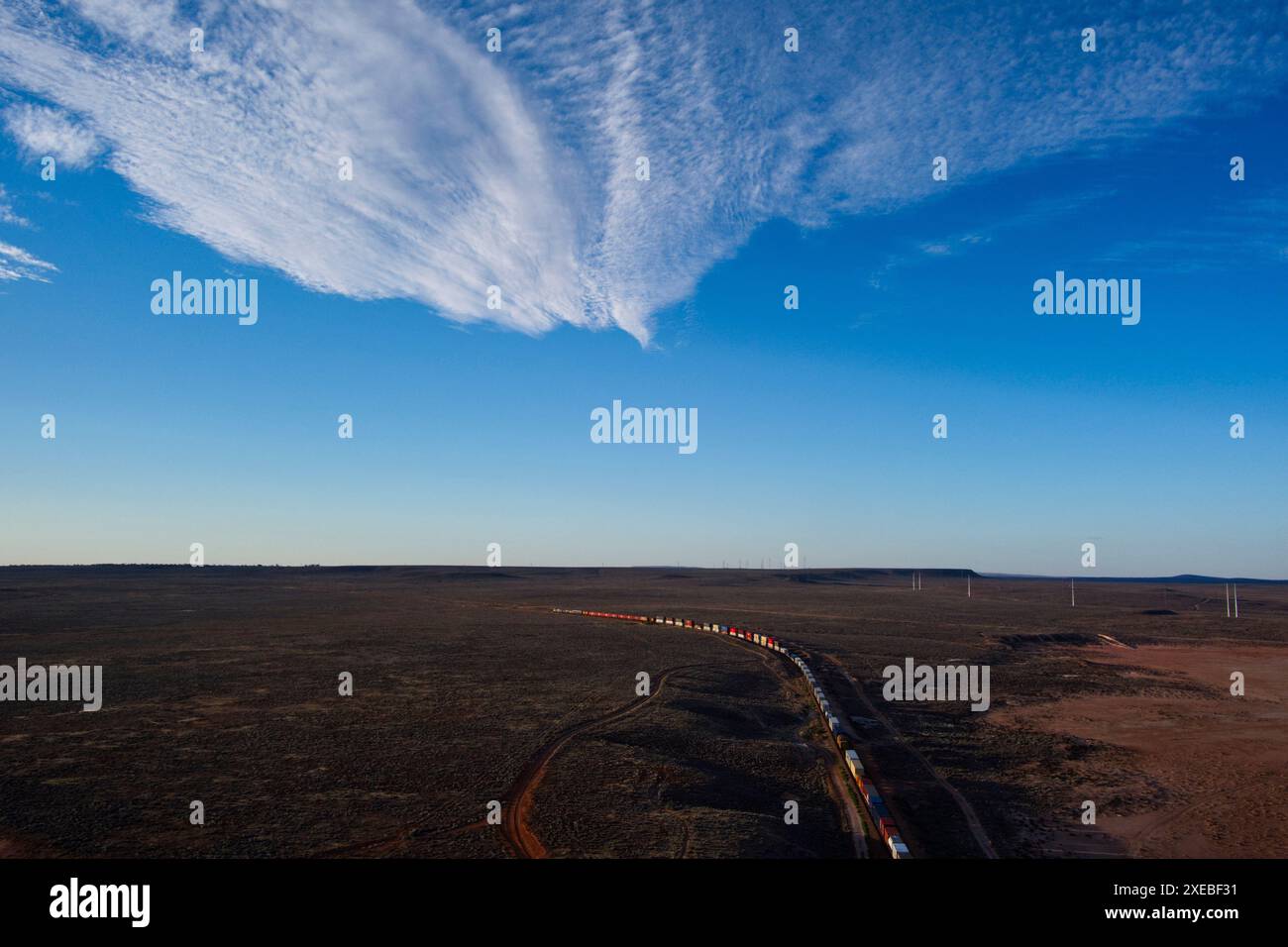 Aerial of container intermodal freight train heading for Darwin from ...