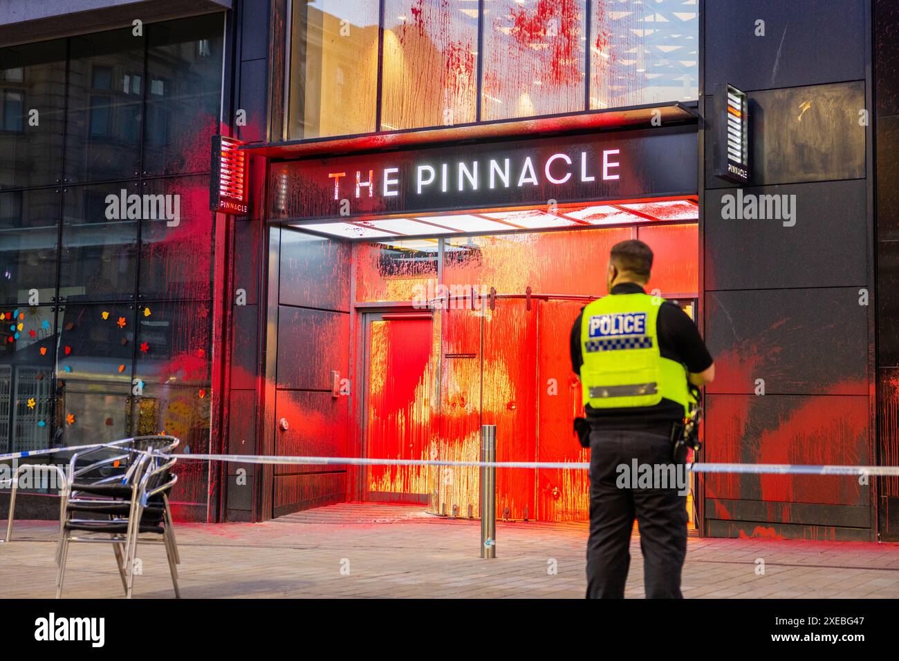 Leeds, UK. 27 JUN, 2024. Police officer watches on as direct action ...