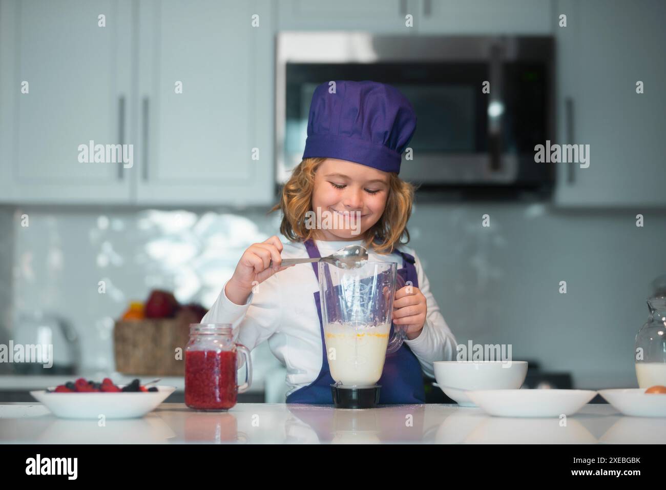 Child chef cooking meal. Kid making tasty delicious. little boy in chef ...