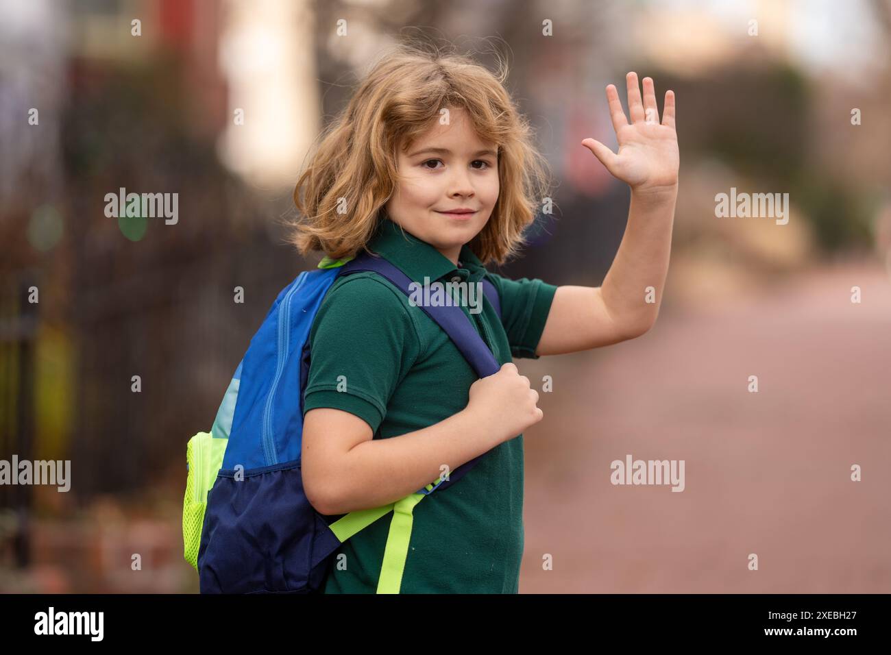 Schoolkid getting on the school bus. American School. Back to school ...
