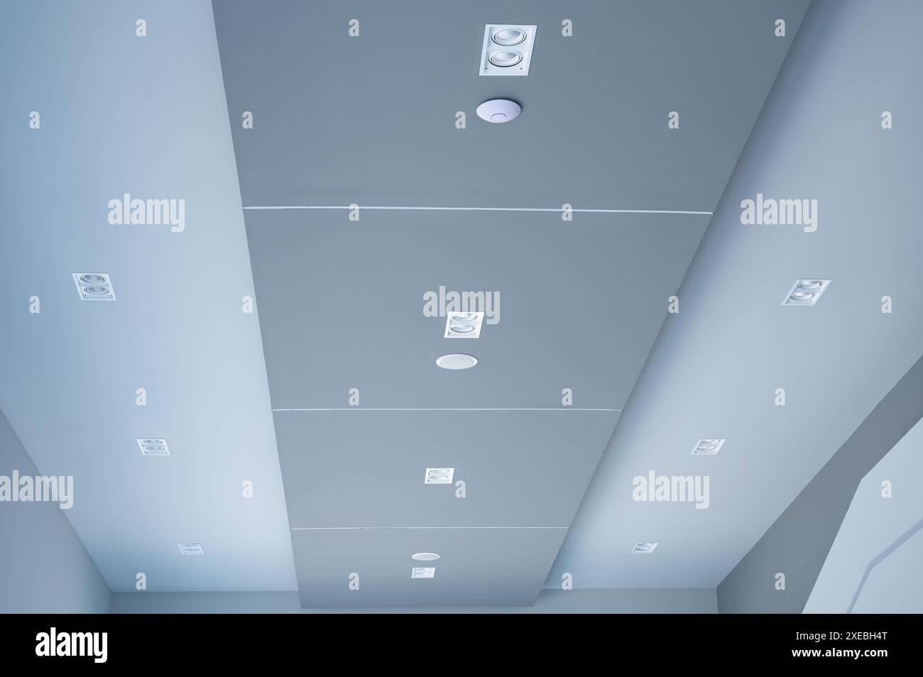 Interior of modern office ceiling with LED light bulb on corridor Stock ...