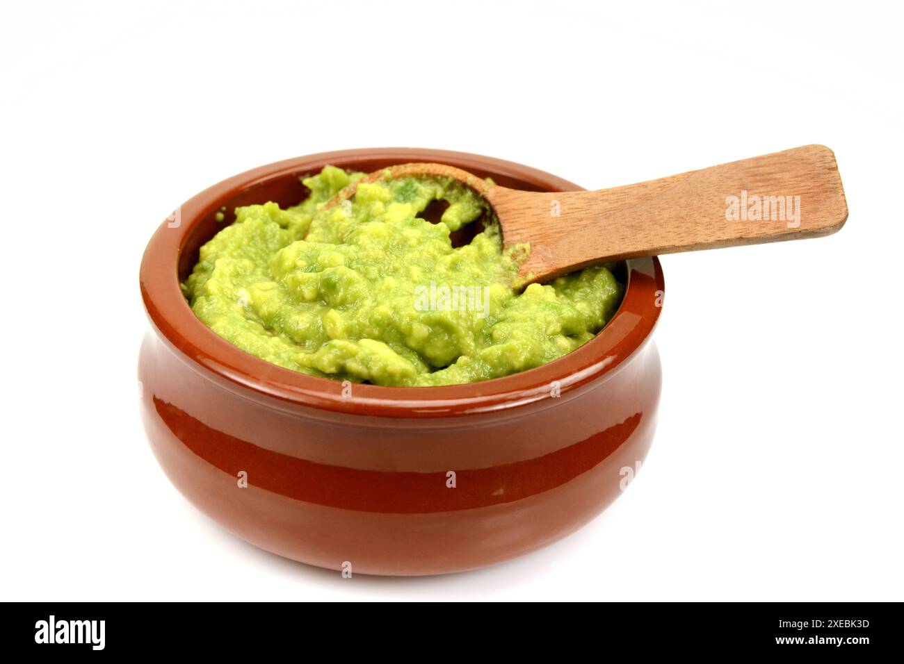 Traditional latinamerican mexican sauce guacamole in a bowl isolated ...