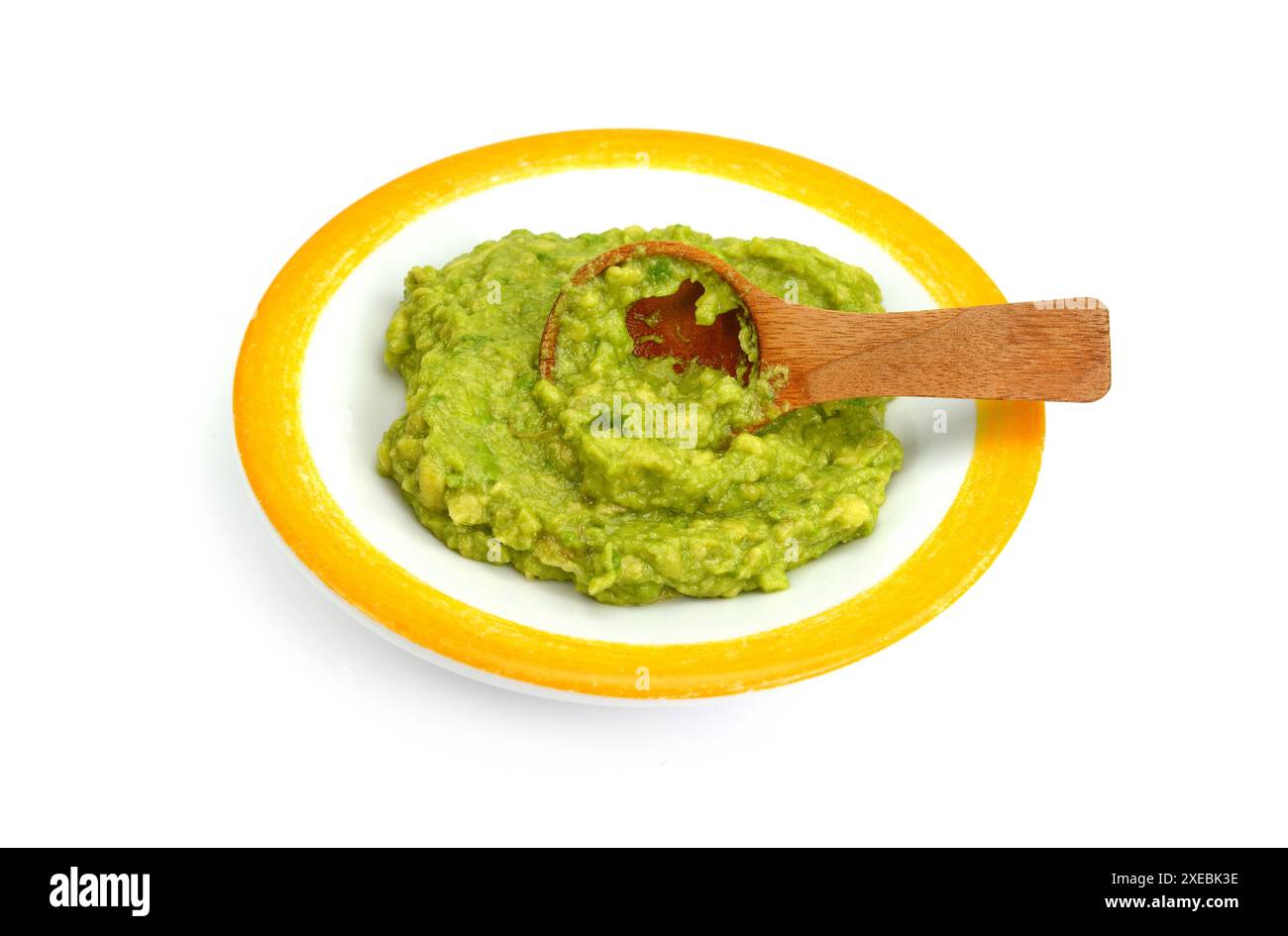 Traditional latinamerican mexican sauce guacamole in a plate isolated ...