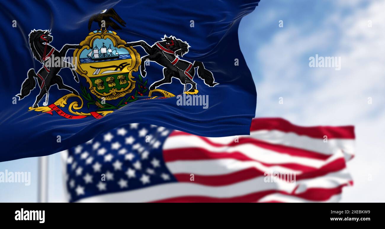 Pennsylvania state flag waving with the american flag Stock Photo - Alamy