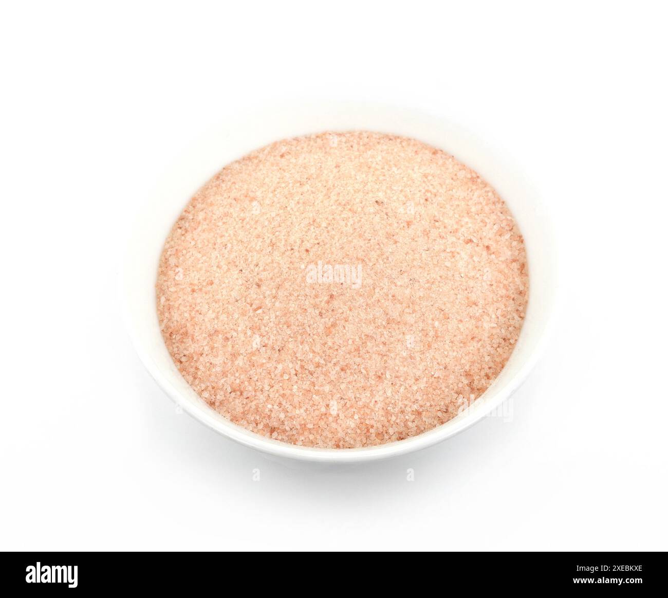 Pink Himalayan fine salt in white bowl isolated on white background ...