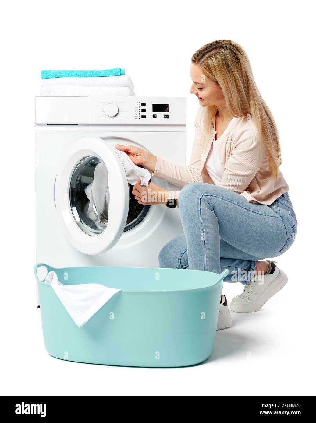 Woman detergent laundry standing Cut Out Stock Images & Pictures - Alamy